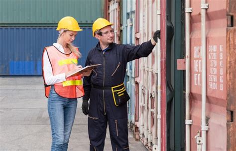Premium Photo Two Foremen Opening Containers Box Door For Checking Products At Cargo Container