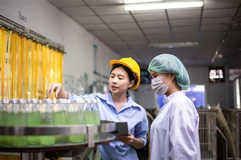 Free Stock Photo Of Female Workers Checking Quality Control For Drink Production Download Free