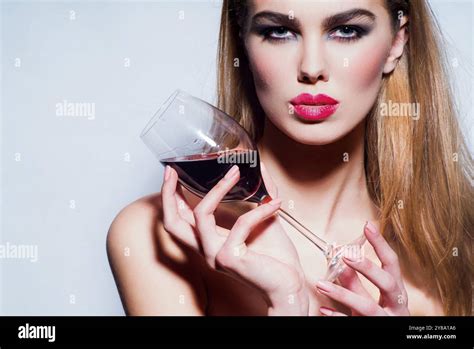 Woman Hold Glass With Red Wine Portrait Of Female Model With Red Wine