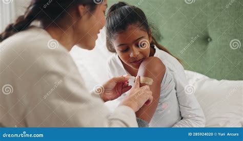 Plaster Knee Or Accident With A Mother And Daughter In The Bedroom For
