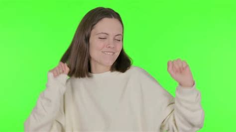 Young Woman Dancing In Joy On Green Background People Stock Footage Ft Dance And Happy Envato