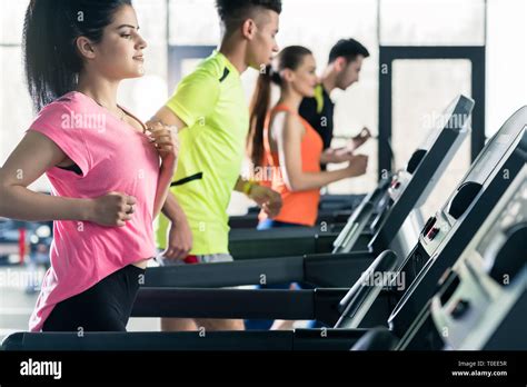 Side View Of A Woman On Treadmill Stock Photo Alamy