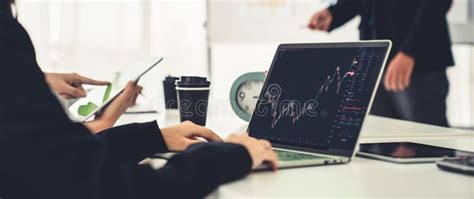 Businesswoman In Analyze Stock Market Data Using Laptop Computer Proficiently Stock Image