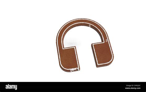 3d Rendering Of Gingerbread Cookie In Shape Of Symbol Of Music Headphones Isolated On White