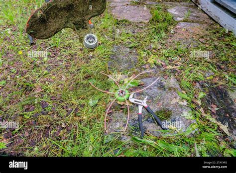 Replacing Strings On Trimmer Dismounted Head With New Strings