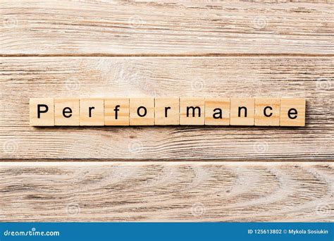 Performance Word Written On Wood Block Performance Text On Table
