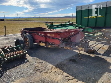 NEW HOLLAND 520 | Online Auctions | EquipmentFacts.com
