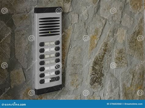 Modern Intercom On Concrete Wall With Stone Fragments Space For Text Security System Stock