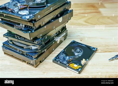 Hard Disk Drive Removable Case For Repair On The Wooden Desk Stock Photo Alamy