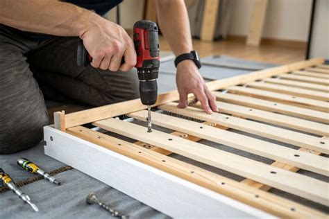 Furniture Assembler Assembling A Bed Stock Illustration Illustration