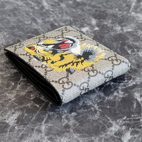 레플리카 구찌 타이거 반지갑 브라운 명품레플리카 가방 지갑 클러치