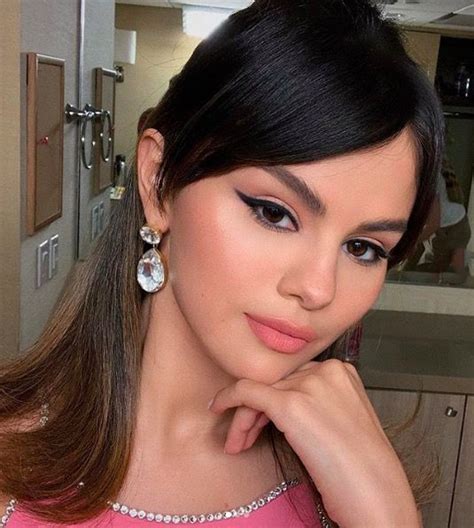 Selena Gomez Haircuts With Side Bangs