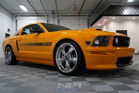 Yellow Mustang With Chrome Wheels
