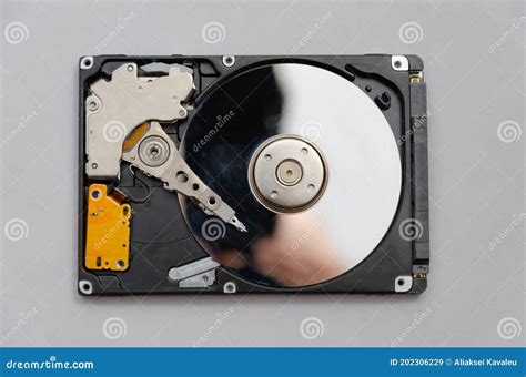 Disassembled Hard Drive From The Computer Hdd With Mirror Effect Opened Hard Drive From The