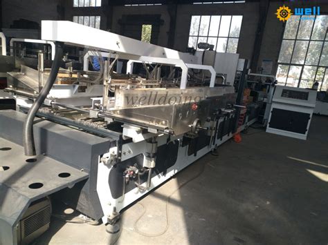 operation of high speed partition assembler insertion machine