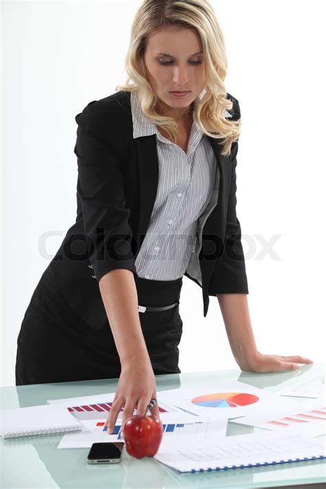 Businesswoman Analyzing Statistics Stock Image Colourbox