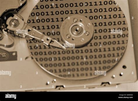 internals of a computer harddrive with binary number reflections with