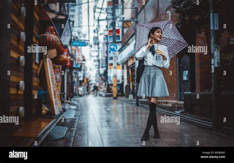 Beautiful Japanese Girl Walking In Tokyo Concept About Teenagers And