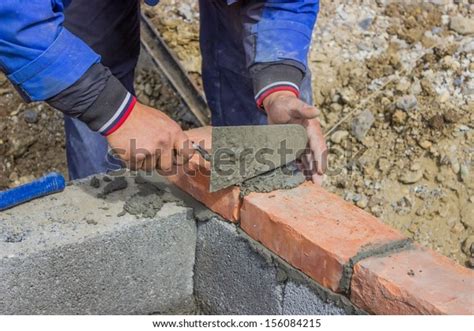 Man Laying Concrete Block Bricks Wall Stock Photo 156084215 Shutterstock