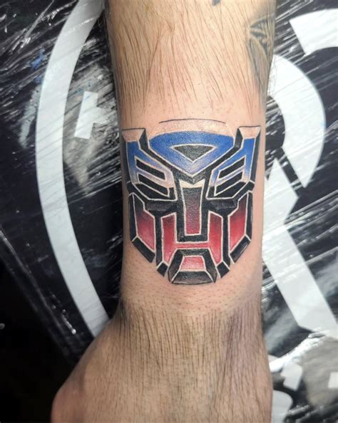 35 Incredible Transformers Tattoos To Help You Roll Out