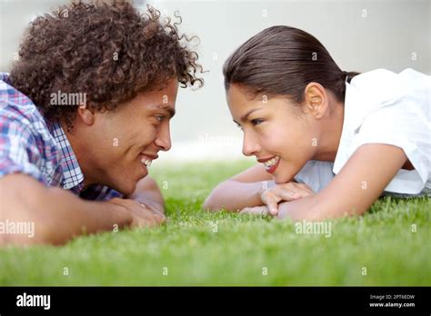 Were A Great Match A Happy Young Couple Gazing Into Each Others Eyes