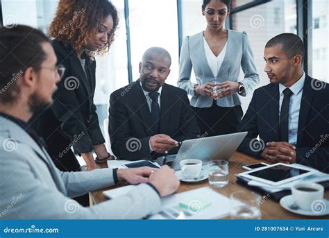 Getting The Team Focused On The Immediate Task A Group Of Businesspeople Discussing Something