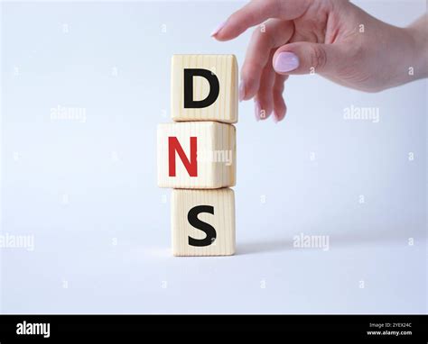 Dns Domain Name Server Consumer Price Index Symbol Concept Word Dns On Wooden Cubes