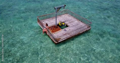 Video Stock Sexy Woman Lady Girl Floating Sunbathing Raft In The Middle Of The Ocean In Maldives
