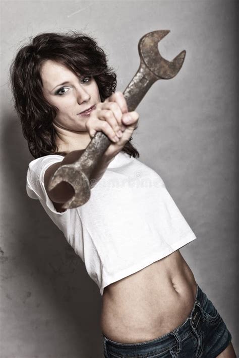 Girl Holding Wrench Spanner Tool Stock Photo Image Of Attractive Handyman