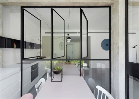 Thin Black Frames Draw The Eye Around A Renovated Tel Aviv Apartment