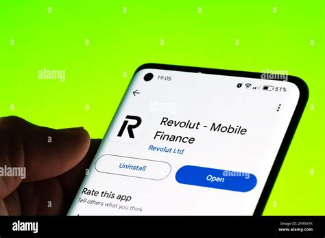 Revolut Mobile Finance App Displayed On A Smartphone Screen Highlighting Options To Open Or