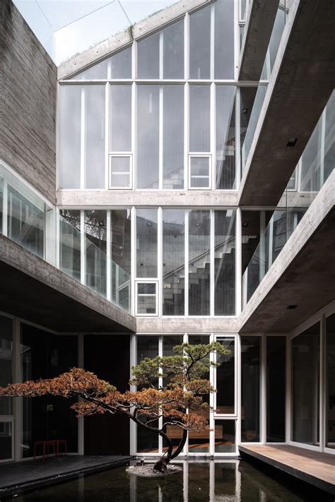 Atelier Gratia Completes Angular Concrete Courtyard House In Taiwan