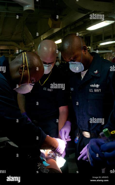 100125 N 5712p 018 Haiti Jan 25 2010 Lt Raynard Gibbs From Cuba Ala Hospitalman Marco