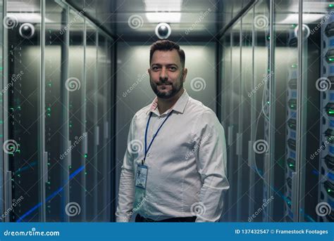 Smiling Engineer In Corridor Of Data Center Stock Image Image Of Center Elegant 137432547