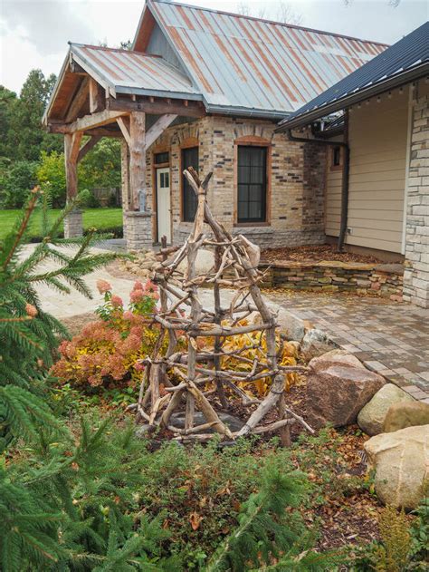 How To Build Garden Obelisk Trellis With Branches And Twigs Diy Hometalk