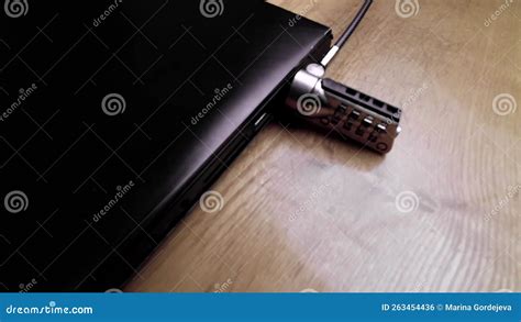 Workplace Safety Concept The Laptop Is Locked With A Cable Lock Stock Footage Video Of Metal