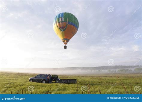 Hot Air Balloon Getting Ready For Launching Car And Trailer With