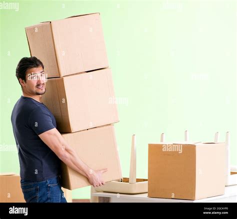 The Man Moving House With Boxes Stock Photo Alamy
