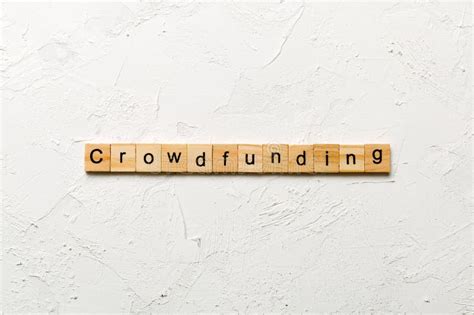 Crowdfunding Word Written On Wood Block Crowdfunding Text On Cement