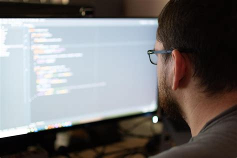 Premium Photo An Over The Shoulder View Of A Software Engineer In A