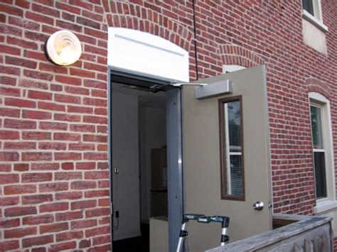 how can i install a metal door in an exsisting block wall windows