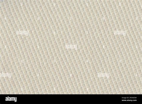 Woven Glass Fiber Wallpaper Against A Light Yellow Background Meant As