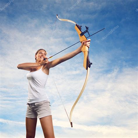 Woman With Bow And Arrow Stock Photo By Stokkete 45707865