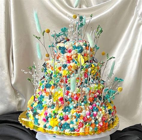 Colorful Birthday Cake With Sprinkles And Flowers