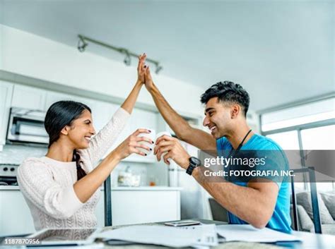 Indian Couple In Kitchen Photos And Premium High Res Pictures Getty