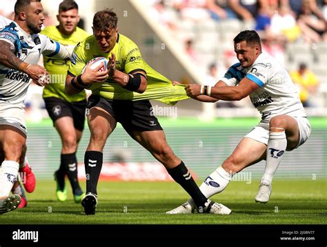 Wakefield Trinitys Jai Whitbread Has His Shirt Pulled By Toulouse
