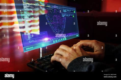Man Typing Computer Keyboard With Futuristic Hologram Screen Abstract Concept Of Cyber Security