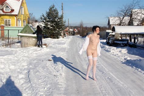 Brunette In White Stockings Walking At Snow Covered Village Russian Sexy Girls