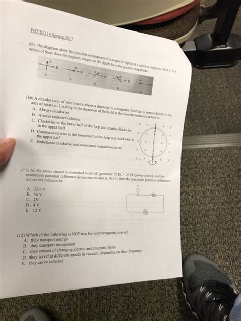 Solved A Circular Loop Of Wire Rotates About A Diameter Is