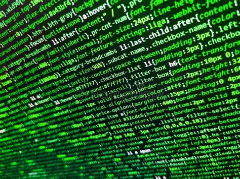 Software Developer Programming Code On Black Screen Screen Of Web